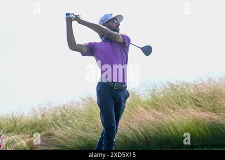 Akshay Bhatia watches his tee shot on the fifth hole during the third round of the St. Jude ...