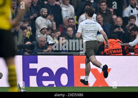 streaker and pitch invader invades the pitch with a Mellstroy t-shirt ...