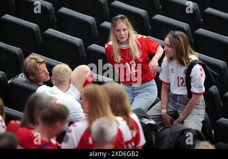 Denmark's Kasper Dolberg and partner Laerke Julie Tranberg after the ...