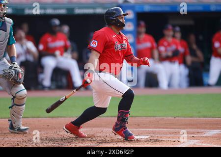 Seattle Mariners first baseman Josh Naylor loses his cap after tagging ...