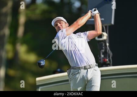 Denny McCarthy watches his tee shot on the third hole during the final ...