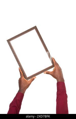 Black african hand holding rectangular wooden frame isolated on white ...