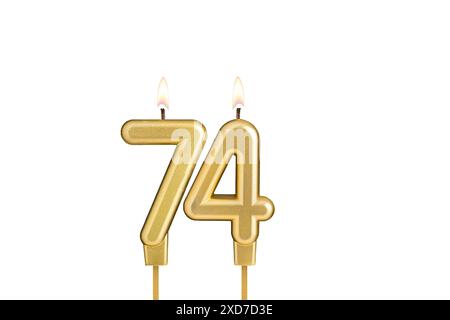 Birthday number 74 - Golden candle on white background Stock Photo - Alamy