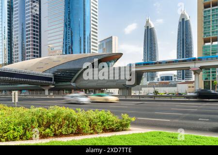 Awesome view of train of the Dubai Metro arriving to Financial Centre ...