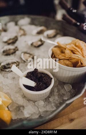 Delicious black caviar on ice. Wholesale market Stock Photo - Alamy