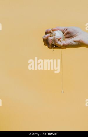 Close up of human hand breaking stone copywriting sign Stock Photo - Alamy