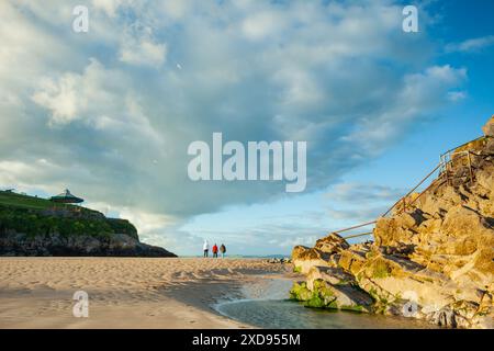 The sunset on Tenby North beach Wales Stock Photo - Alamy