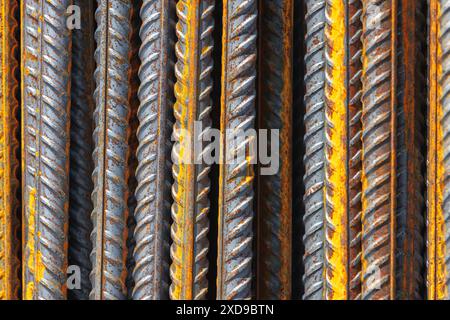 Construction iron rods with rust spots, abstract industrial background ...