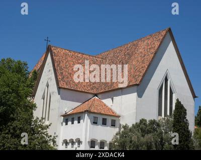 roof with red tiles under blue sky Stock Photo - Alamy