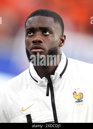 LEIPZIG, GERMANY - JUNE 21: Dayot Upamecano of France runs with a ball ...