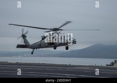 240610-N-IJ966-1042 PACIFIC OCEAN (June 10, 2024) An MH-60S Sea Hawk ...