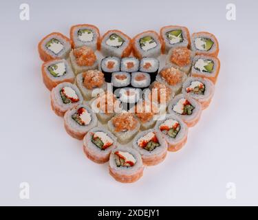 a set of heart-shaped rolls on a white background for a food delivery ...