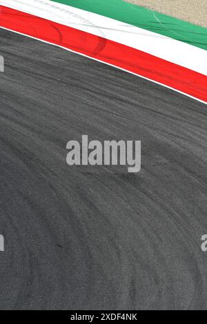 colored curb on a racing track Stock Photo - Alamy