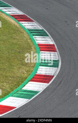 colored curb on a racing track Stock Photo - Alamy