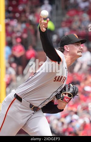 San Francisco Giants pitcher Sean Hjelle, facing, stands with teammates ...