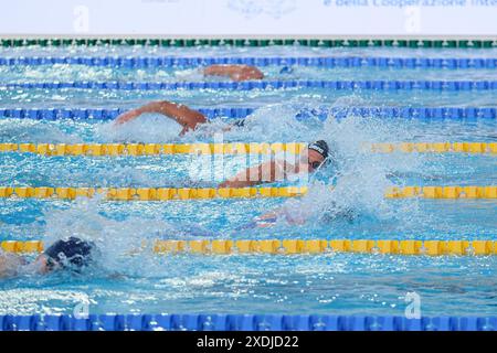 Competitors swim in the women's 800m freestyle timed heat during the ...