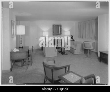 Americana Hotel. Suite 5002, living room, sofa group, day view through ...