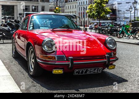 Red Porsche automobile parked on street, London, England, UK Stock ...