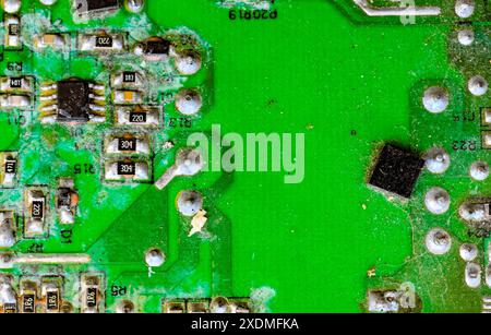 Vintage green populated printed circuit board PCB showing the ...