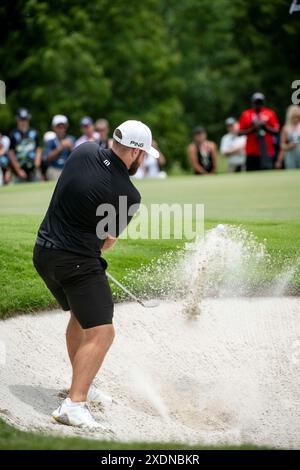 Tyrrell Hatton of Legion XIII hits his shot during the second round of ...