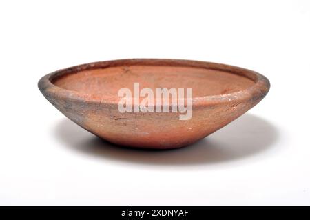 Plate-shaped containers made from clay white background Stock Photo - Alamy