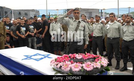 BEIT JAAN, ISRAEL - JUNE 16: Israeli soldiers carry the flag-draped ...