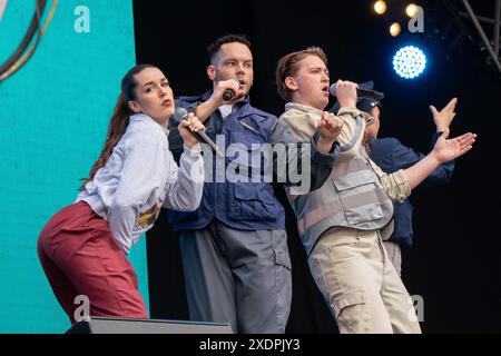 The cast of 42 Balloons perform on stage at West End Live. West End ...
