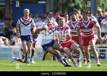 Wakefield Trinity's Oliver Pratt is tackled by Leigh Leopards' David ...