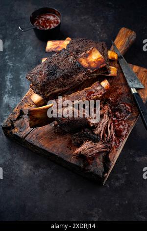 Traditional barbecue burnt chuck beef ribs marinated with spicy rub and ...