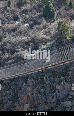 Suspension excursion bridge over gorge. Sightseeing holiday tour ...