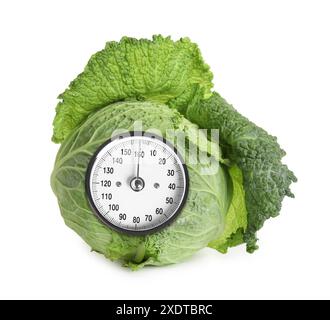 Green cabbage with analog weighing scale display isolated on white ...