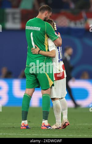 Leipzig: Luka Modric of Croatia and Gianluigi Donnarumma of Italy ...