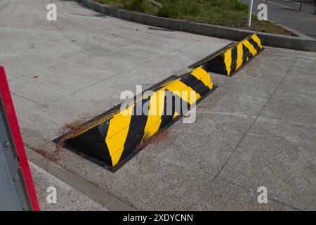 Two raisable road blockers for preventing of cars enter Stock Photo - Alamy