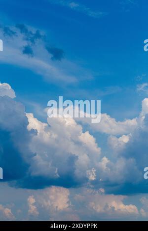Regular spring clouds on blue sky at daylight in continental europe ...