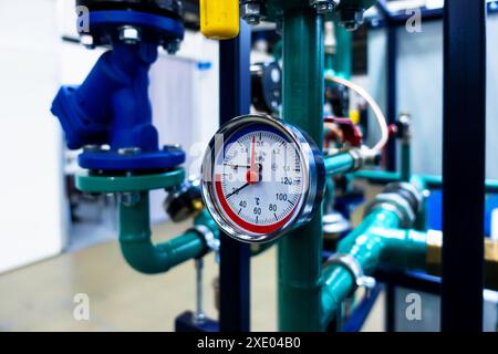 A pressure gauge with a scale for measuring the pressure of a liquid or ...