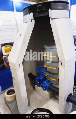 Concrete well with hatch. Sectional view Stock Photo - Alamy