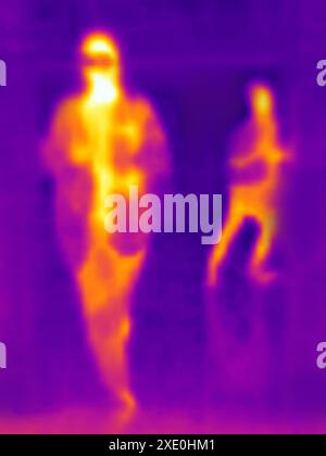 The image from thermal imager device. Human heat map. Blurred ...