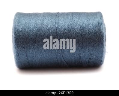 Full cross-wound spool of thin sewing tread isolated on white ...
