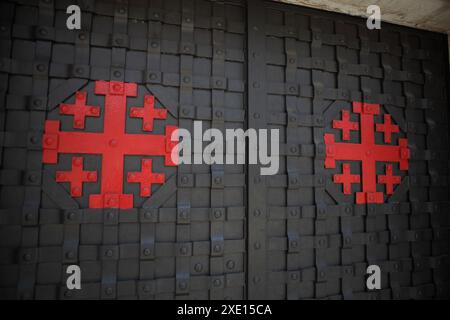 Jerusalem Cross symbolising the Stigmata, the Holy Land Cross, the gate ...