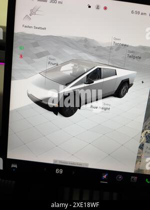 Interacting with Tesla Cybertruck Touchscreen Interface Stock Photo - Alamy