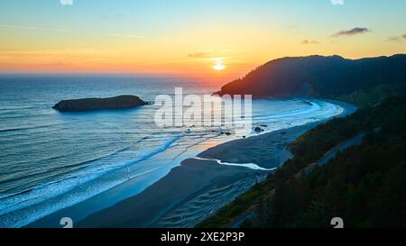 Sunset over beach, Oregon Stock Photo - Alamy