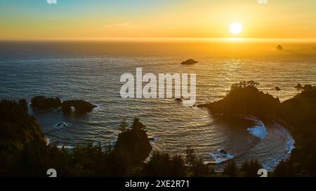 Sunset over rugged coastline of Sand Beach on a cool Fall evening in ...