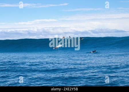 Teahupoo, Tahiti, French Polynesia - June 7, 2024 a lone surfer ...