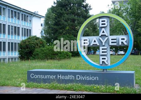 Bayer logo and Consumer Health Division sign, pharmaceutical industry ...