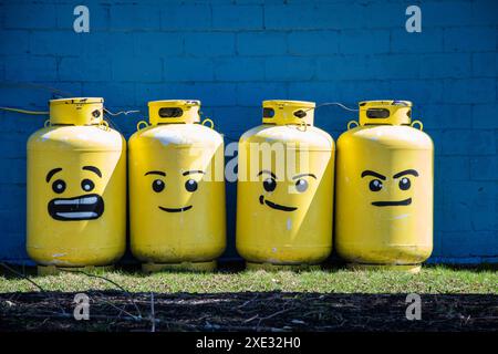 Yellow propane tanks decorated with faces at Riverfront Park in ...