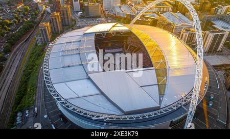 Aerial view of concert at Wembley stadium at sunset in London, England ...
