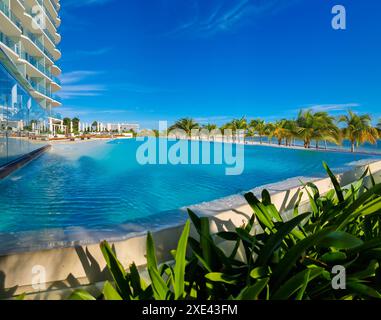 Infinity Pool at a resort in Cancun Mexico Stock Photo - Alamy