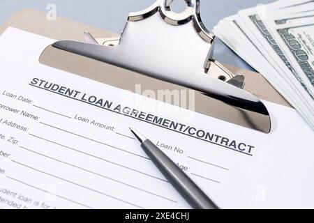 Student Loan Application form on table. Education cost Stock Photo - Alamy