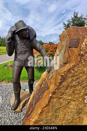 bronze statue 'The Smuggler' at the old customs office on the border ...