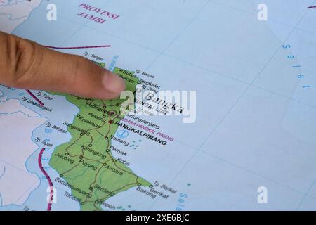 Finger Pointing to Map of Bangka Island, is a small island located ...